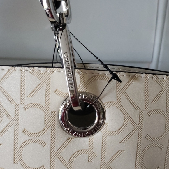 Calvin Klein | Bags | Calvin Klein Logo Reversible Tote Wmatching Pouch ...